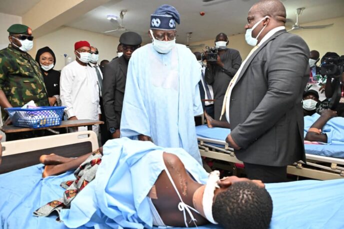PHOTOS: Tinubu visits hospitalised victims of Benue attack | TheCable